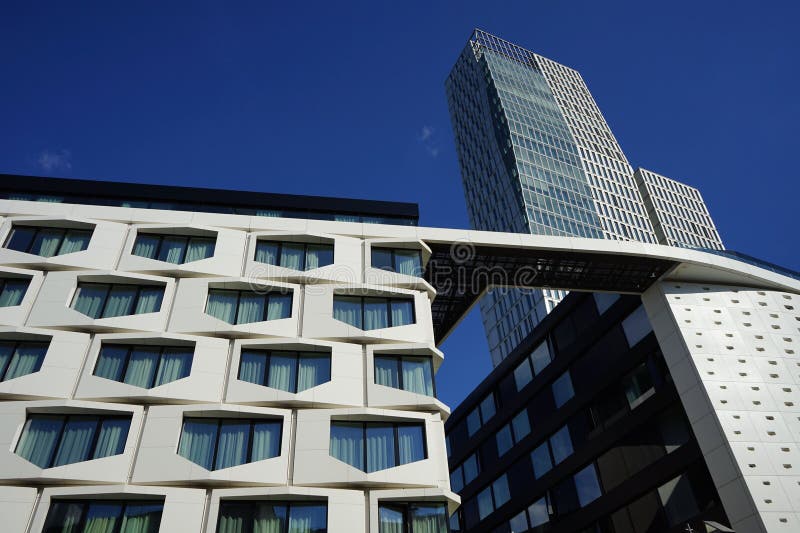 A View of a Tall Building with Many Windows in Front of it Stock Image ...