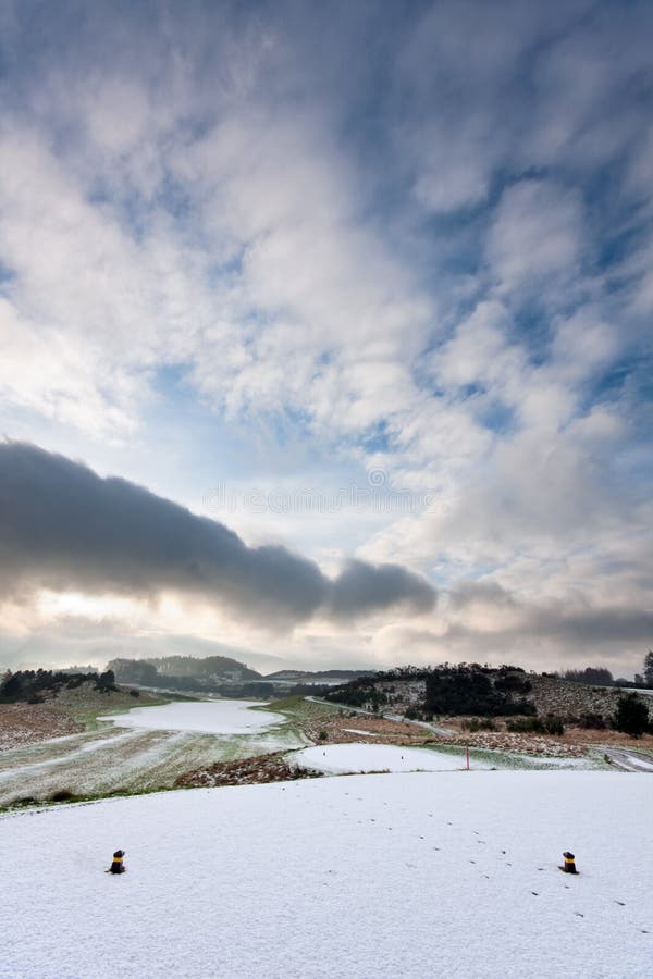 View from Tee on a Snowy Golf Course in Winter Stock Photo - Image of ...