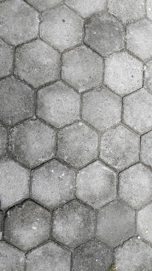 A View of a Tiled Floor Featuring a Unique Pentagon-shaped Pattern ...