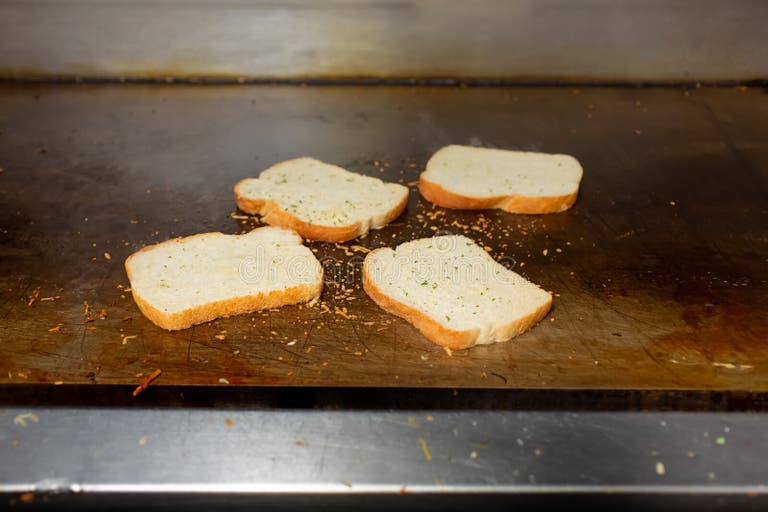Toast bread on griddle stock photo. Image of pile, healthy - 239060662