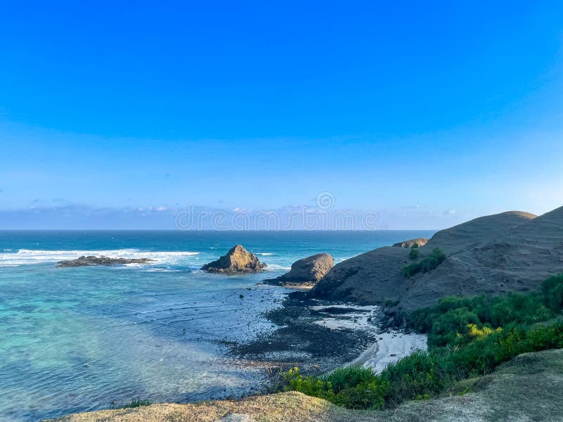 The View from the Top of the Cliff with Large Rocks on the Edge of the ...