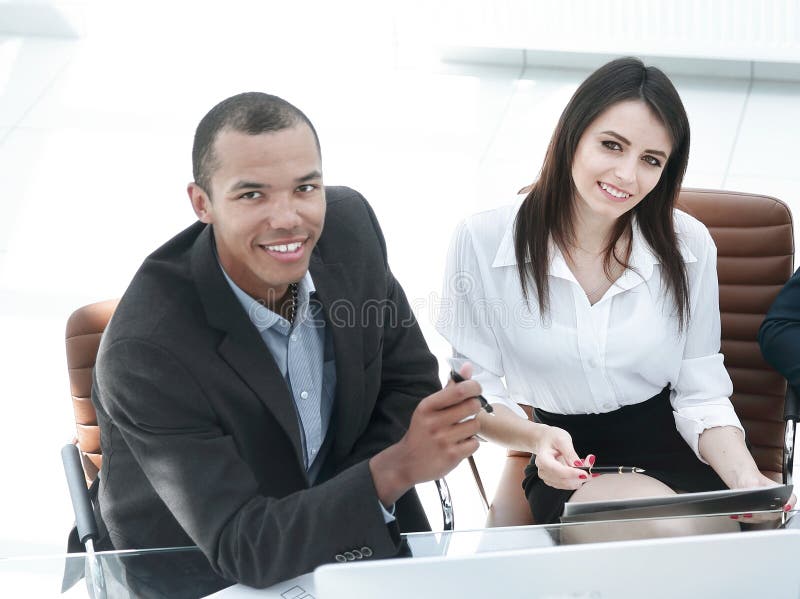 View from the Top.successful Business Team Sitting at Desk Stock Photo ...