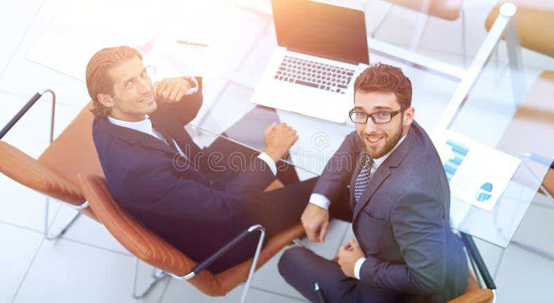 Successful Employees Sitting Behind a Desk Stock Image - Image of human ...