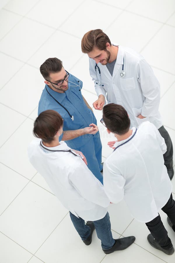 View from the Top. Team of Doctors Discussing the Problems Stock Image ...