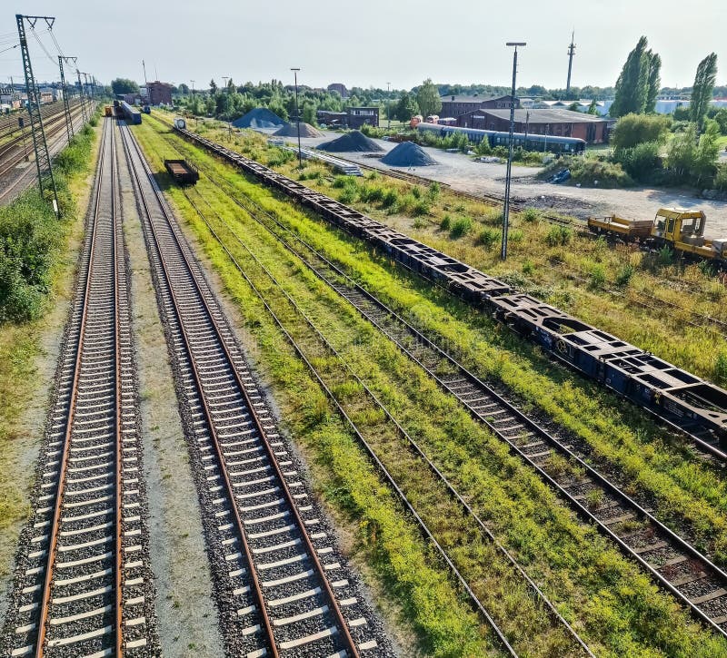 View of the Tracks of a Freight Station with Some Wagons and Numerous ...