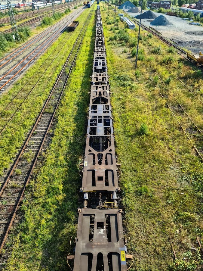 View of the Tracks of a Freight Station with Some Wagons and Numerous ...