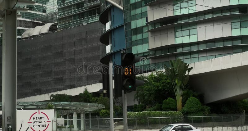 View of a Traffic Light Installed at a Busy Intersection in the City ...