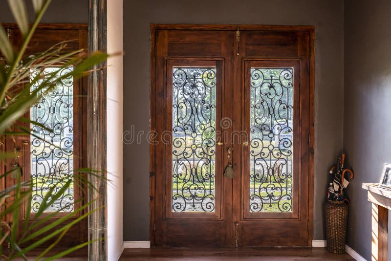View of a Trendy Wooden Front Door from the Inside House Stock Image ...
