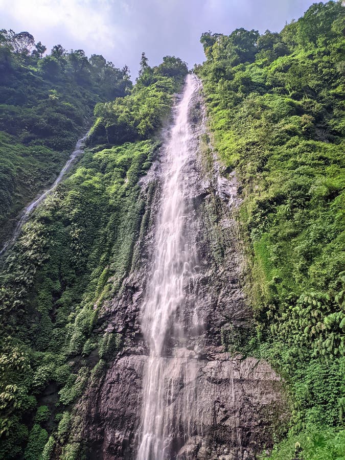 View of tretes waterfall stock image. Image of view - 278482349