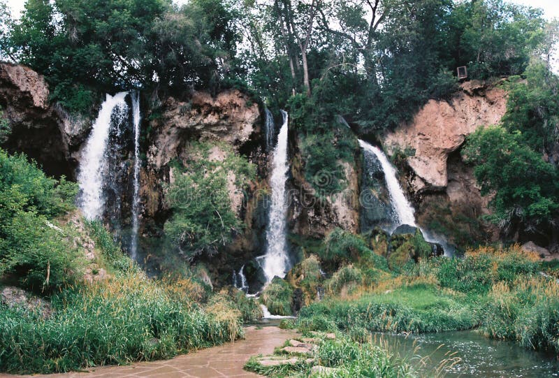 Walking Path at the Base of Rifle Falls Stock Image - Image of rocks ...