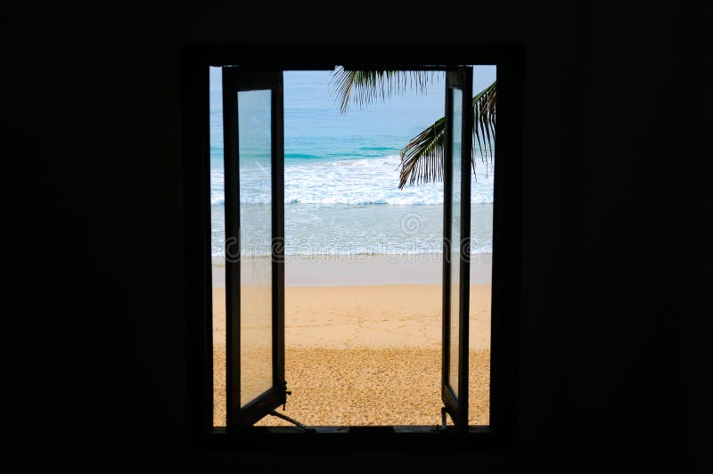 View of a Tropical Beach and Palms through an Open Window Stock Photo ...