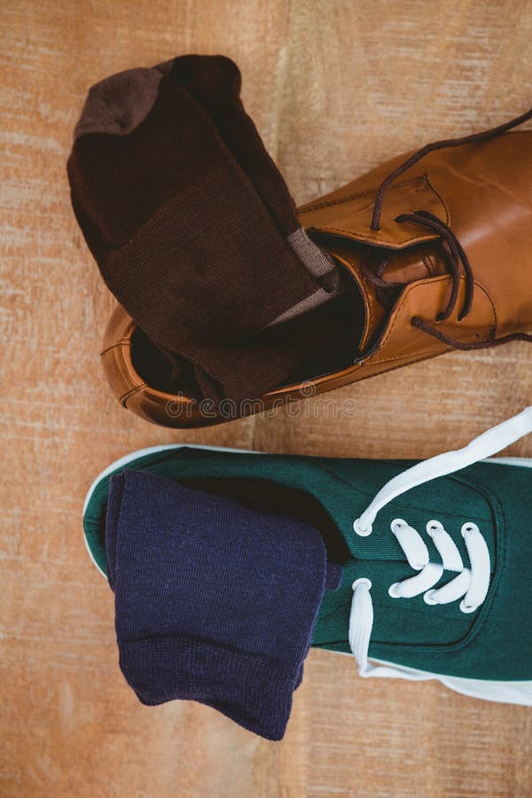 View of Two Different Shoes Stock Photo - Image of socks, denim: 61437018