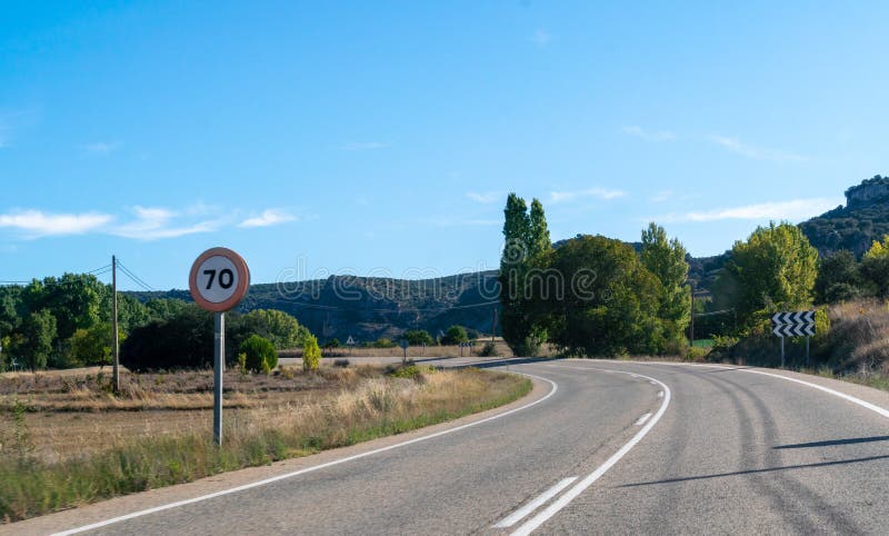 View of Two Direction Road in Spain with Speed Sign Stock Image - Image ...