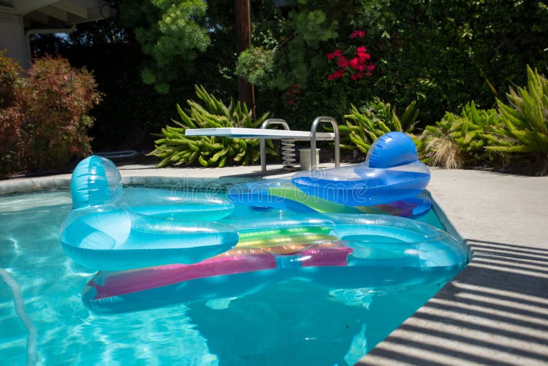 Swimming Pool Inflatable Floaties Stock Photo - Image of retail, bathe ...