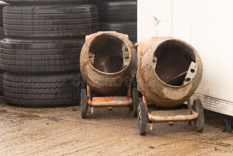 View of Two Messy Cement Mixers at Construction Site Stock Image ...