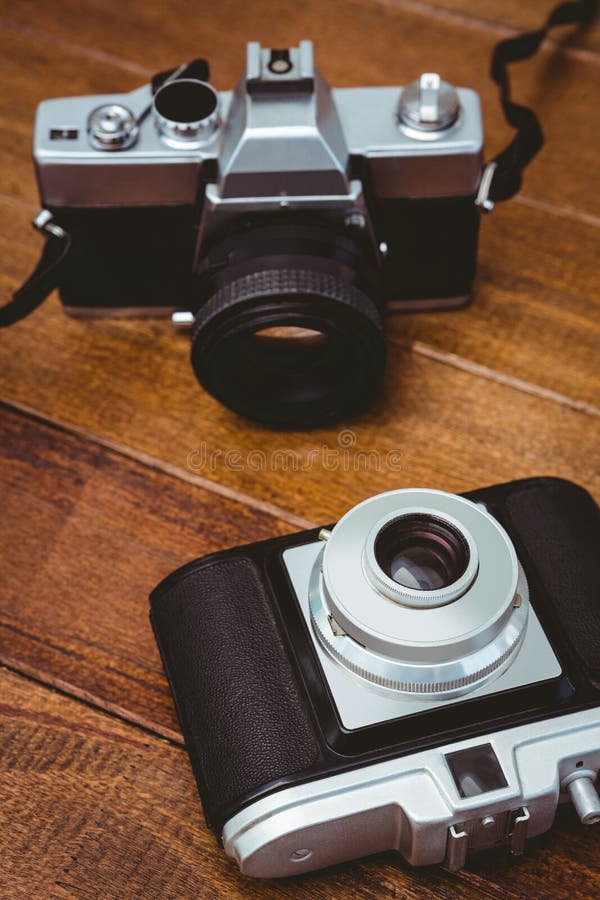 View of two old cameras stock photo. Image of wooden - 61436302