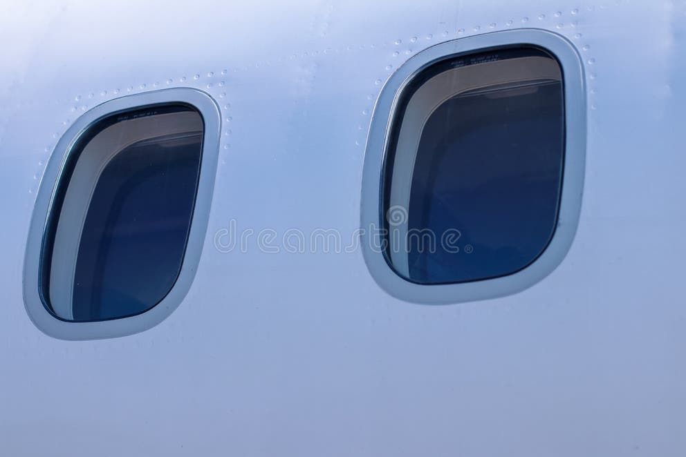 View of Two Passenger Window in Fuselage of the Aircraft Stock Image ...