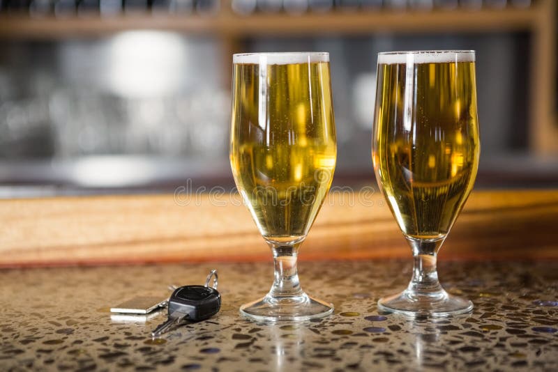 View of Two Pints of Beer and Car Keys Stock Photo - Image of people ...