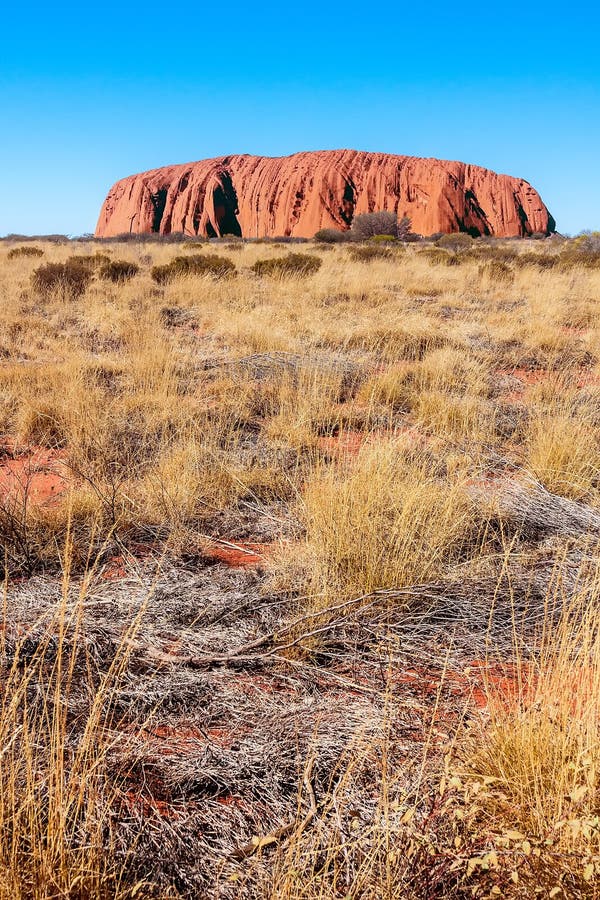Big red rock in Australia editorial stock image. Image of desert - 12563384