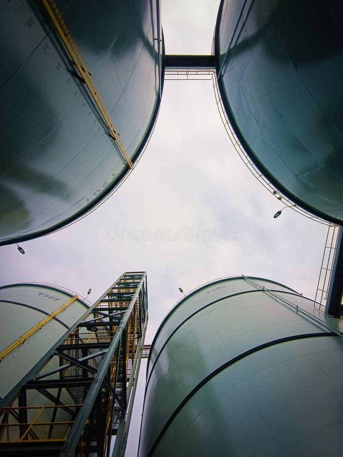 The View from Under the Oil Storage Tank Stock Image - Image of chimney ...