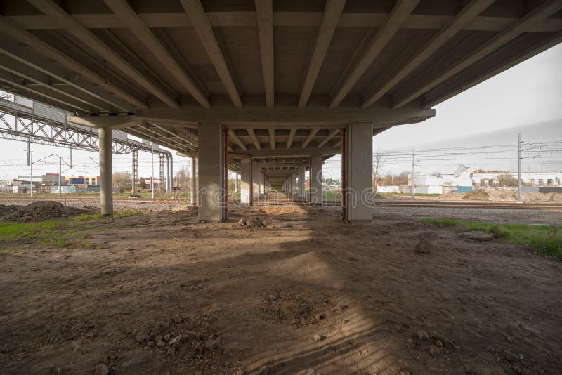 A Viaduct Running Over the Railroad Tracks and Road. Stock Photo ...