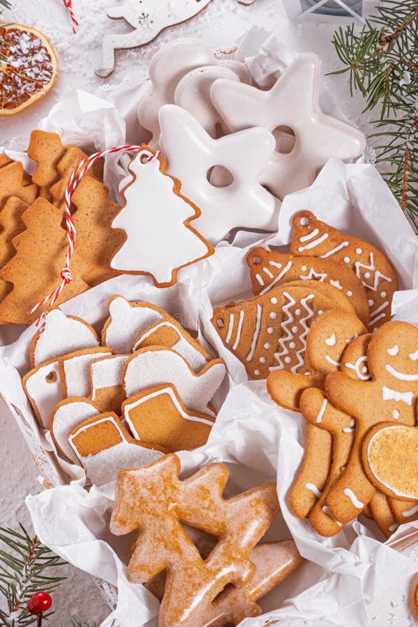 View of the Unpacked Christmas Present with Sweets Inside White Paper ...