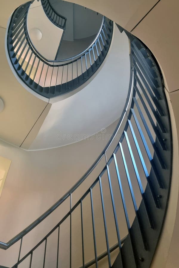 View Up the Beautiful Spiral Staircase in the Building. Stock Photo ...