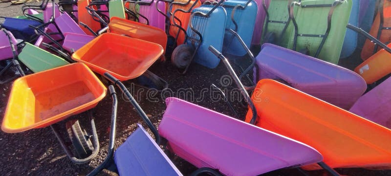 View of Up of Set of Colorful Wheelbarrows Stock Image - Image of ...