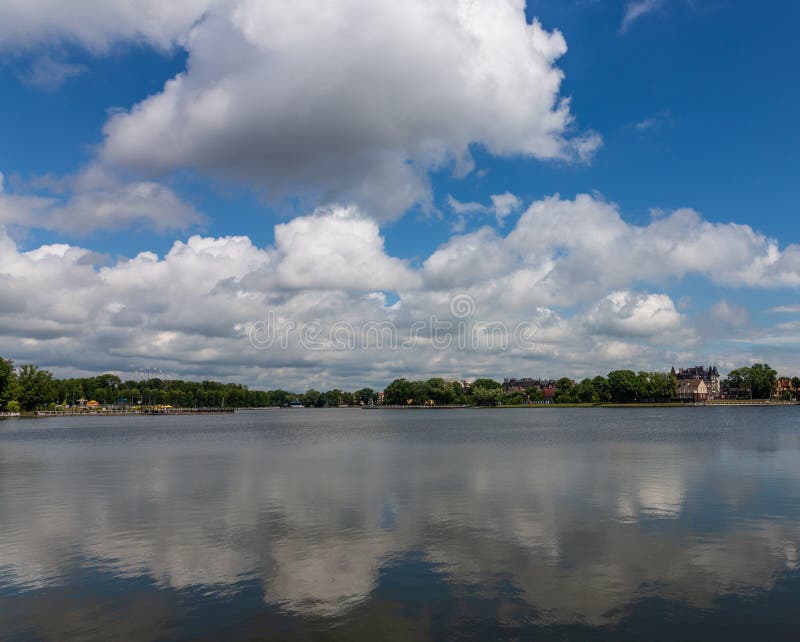 View of the Upper Pond and Clouds Reflected in it, Kaliningrad, Russia ...