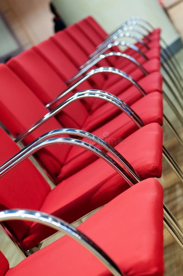 View of a Vacant Row of Red Chairs Stock Image - Image of empty, event ...