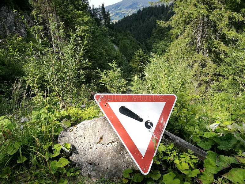 View of a Warning Sign with a Mountain Landscape Background Stock Photo ...