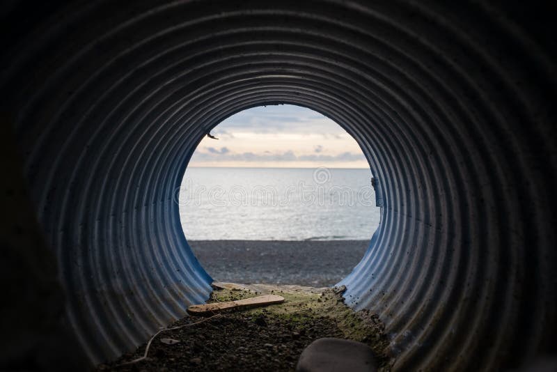View from Water Drainage Pipe on Sea Beach. Stock Photo - Image of ...