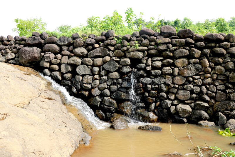 View of Water Falling from Small Stone Wall Stock Photo - Image of ...