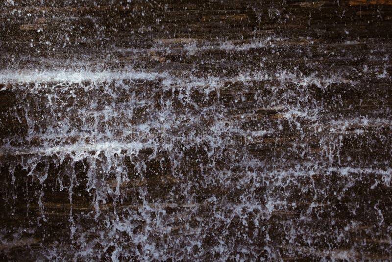 View of the Water Stream Falling Down the Cliffs Looking Like a Cascade ...