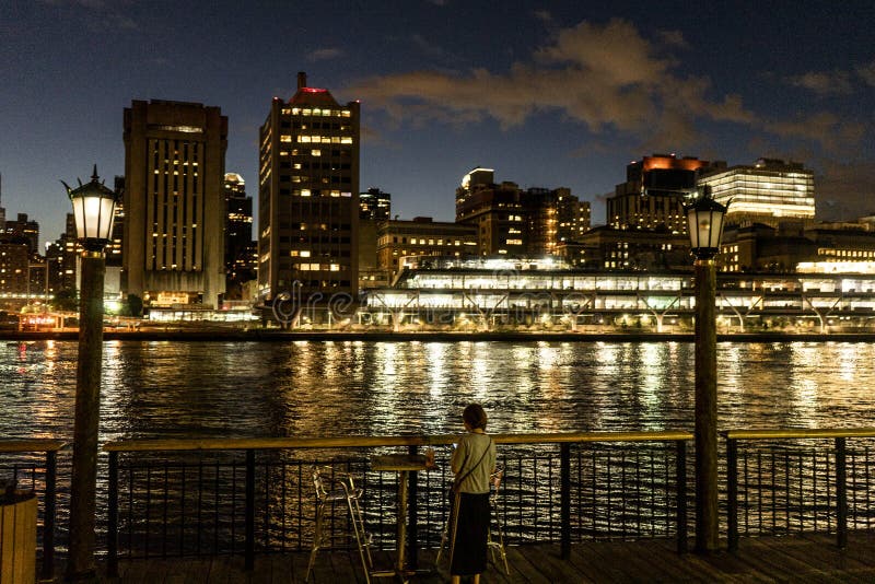 Waterfront in the city editorial stock photo. Image of fence - 173064763