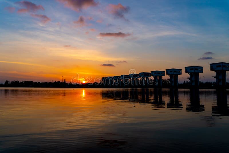 View of Waterproof Dam with Sunset Sky Background Stock Image - Image ...