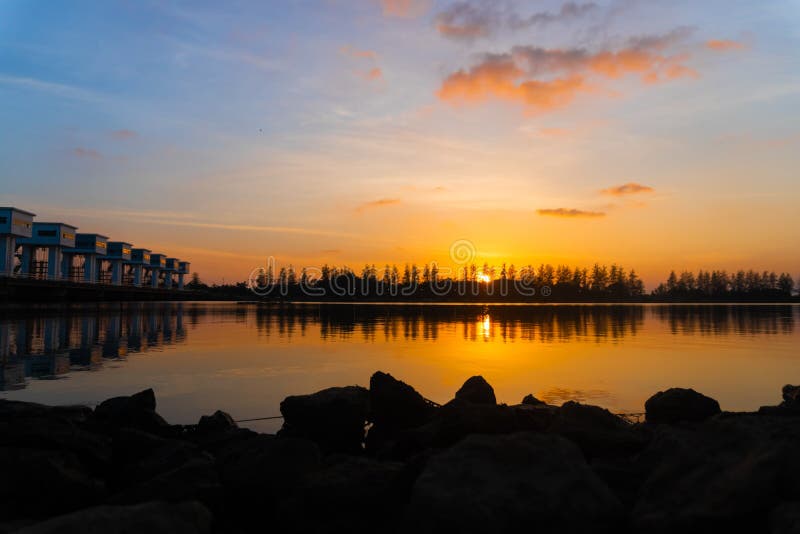 View of Waterproof Dam with Sunset Sky Background Stock Photo - Image ...