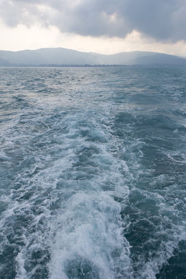 View of Waves Behind a Boat and Dramatic Sky Stock Image - Image of ...