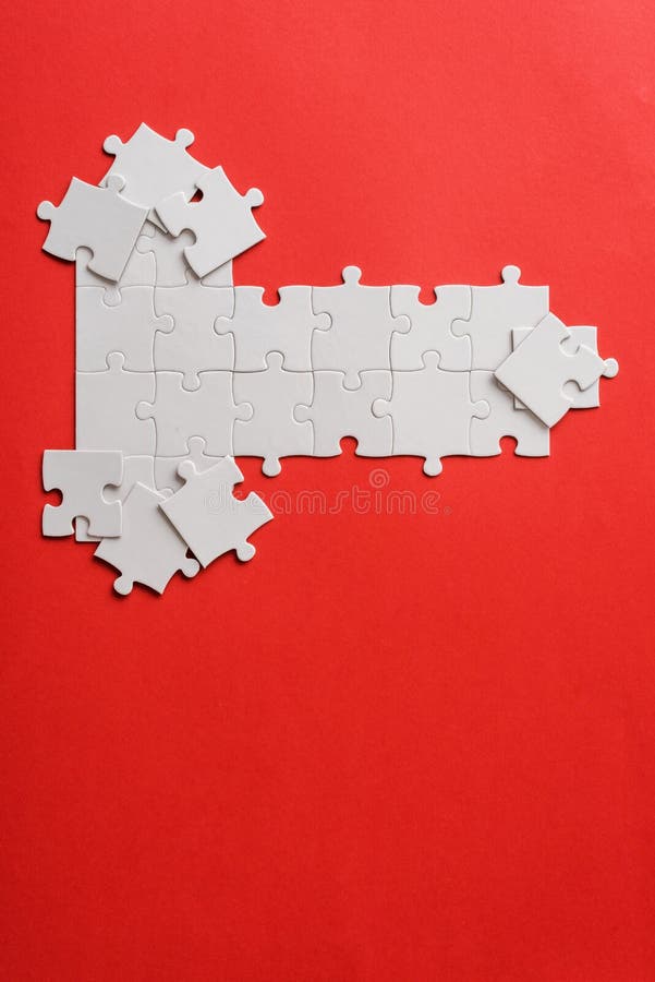 View of White Connected Puzzle Pieces Near Shapes on Red Stock Image ...
