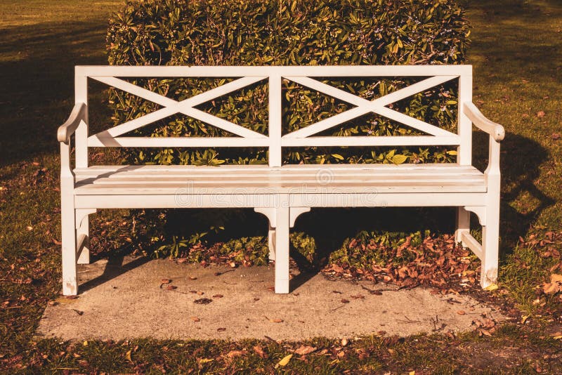 White Patio Bench in the Garden in the Fall Season with the Alone Mood ...
