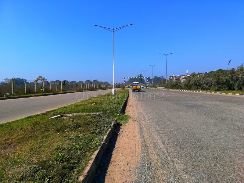 A Wide Road in the Autumn Forest Leads To the River. Golden Autumn in ...