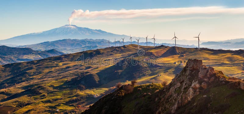 View of Windmills and the Mount Etna Volcano Stock Image - Image of ...