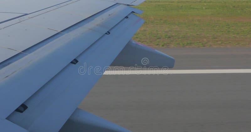 Airplane Wing during Takeoff on Runway Stock Video - Video of runway ...