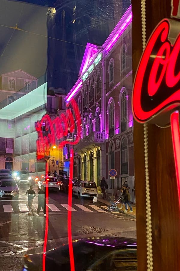 View through the Window of a Cafe on the Night Streets of Lisbon ...