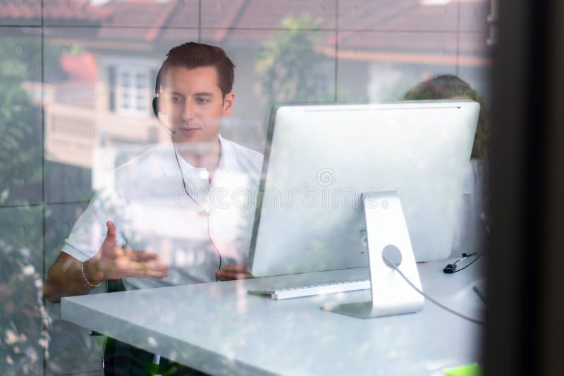 View through Window of Call Center Operation Room Service Agent on Call ...