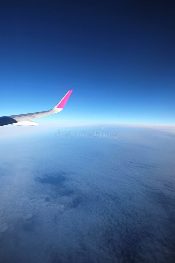 View of Window at Flying Airplane and Sky from Top View. Stock Photo ...