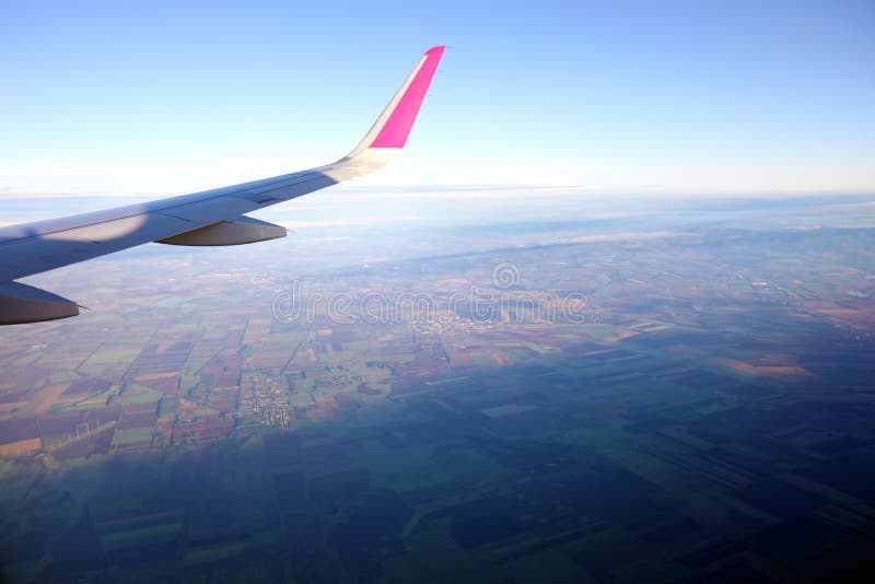 View of Window at Flying Airplane and Sky from Top View. Stock Photo ...
