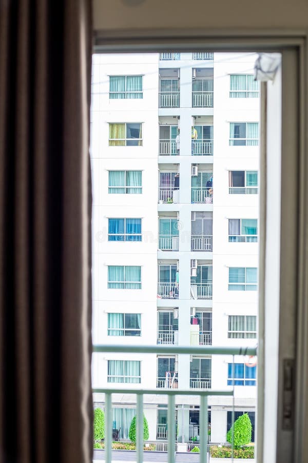 View from the Window of a High-rise Building To a Tall Building ...