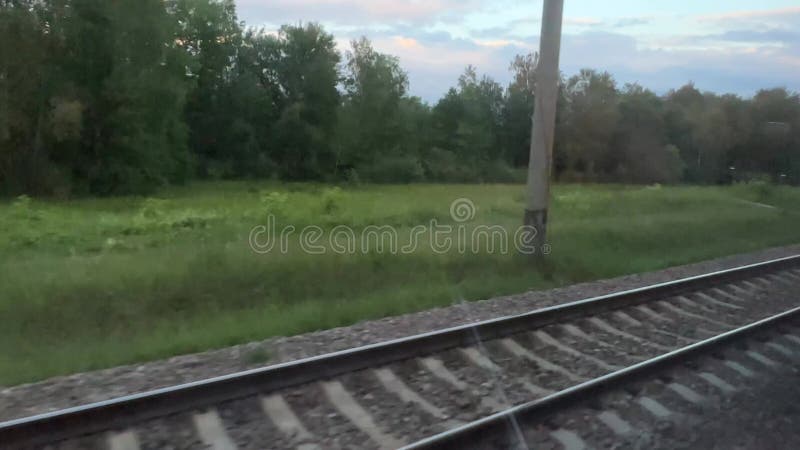 View from the Window of a Passing Train. Train Ride, Sunset, Reflection ...