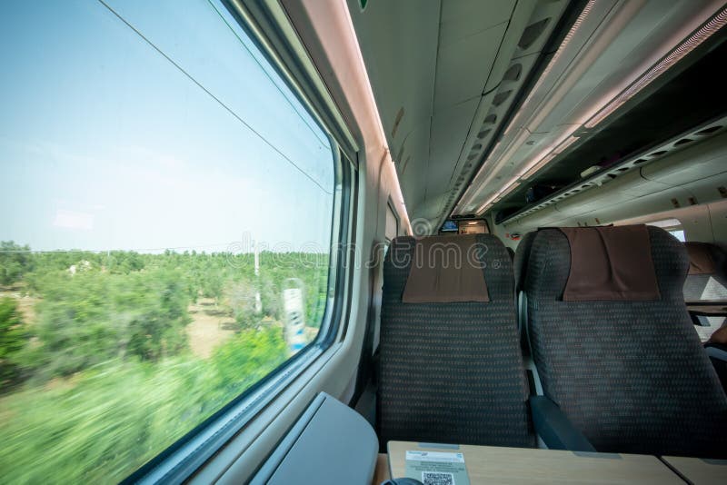 View of a Window Scrolling the Landscape Inside High Speed Train Stock ...